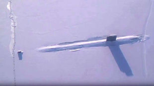 Nuclear Submarine Breaking Through Arctic Ice - WordlessTech