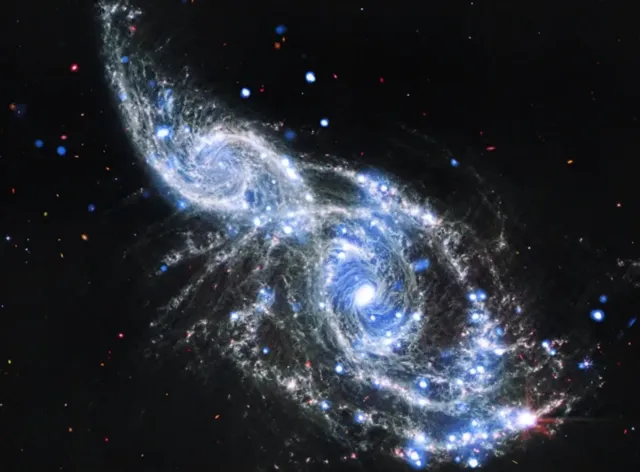 A Beautiful Galactic Embrace - WordlessTech